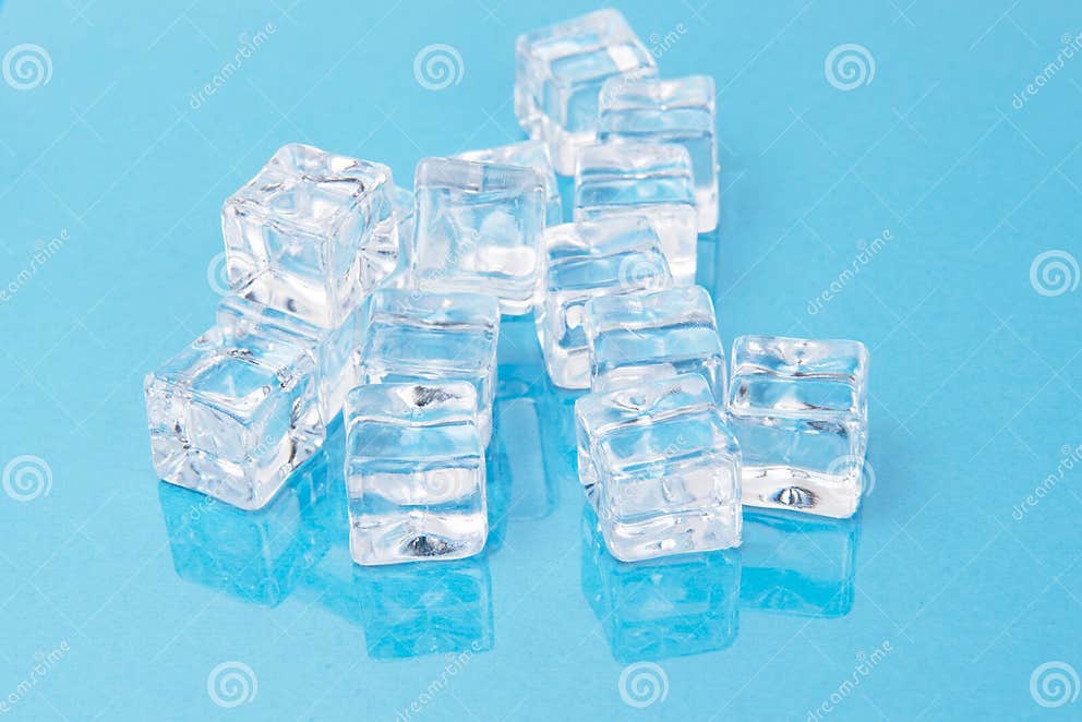 Ice Cubes on Blue Background, Cubes of Ice on a Light Blue Background ...