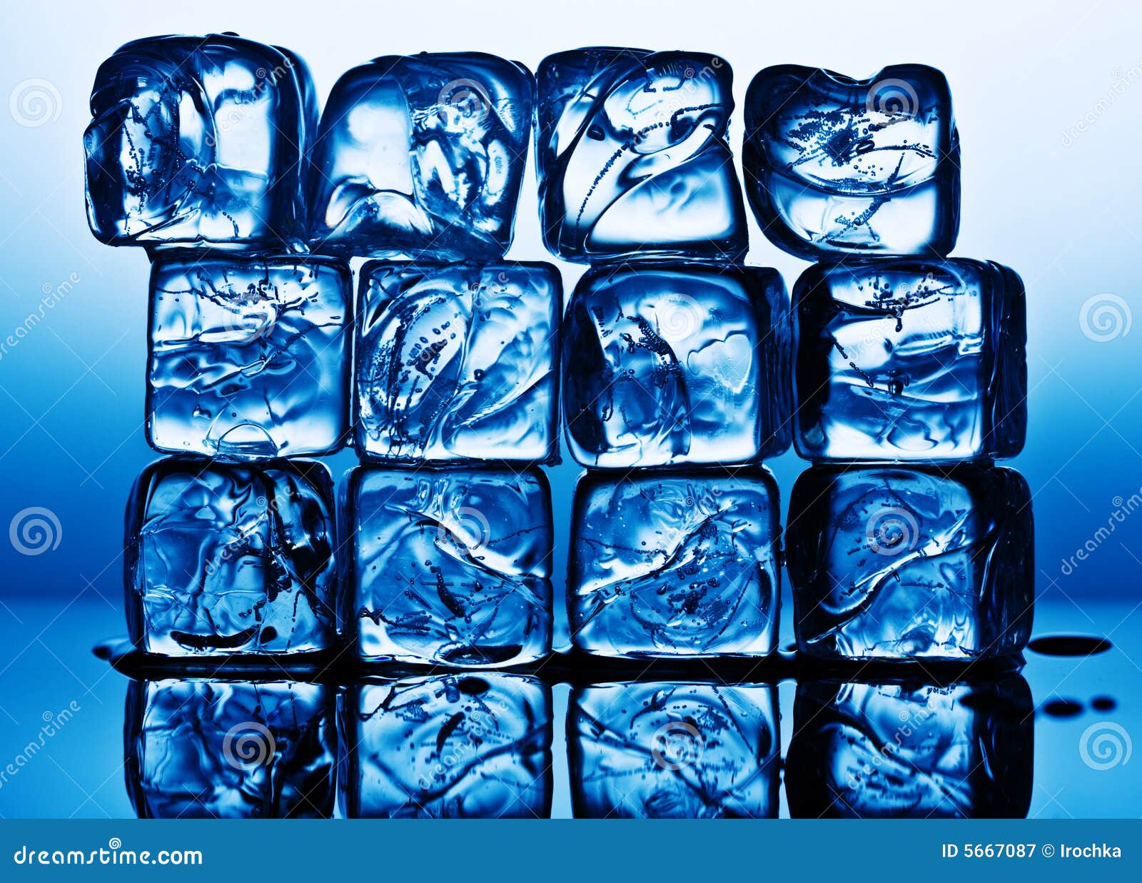 Ice cubes in blue light stock image. Image of cubes, cube - 5667087