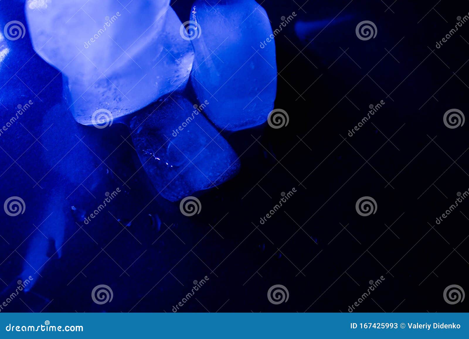 Ice cubes in blue light stock image. Image of melt, blue - 167425993