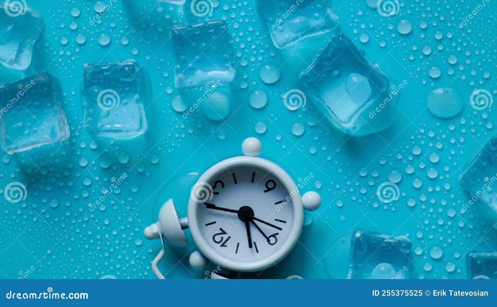 Ice Cubes and a Clock on a Blue Background. Stock Video - Video of ...