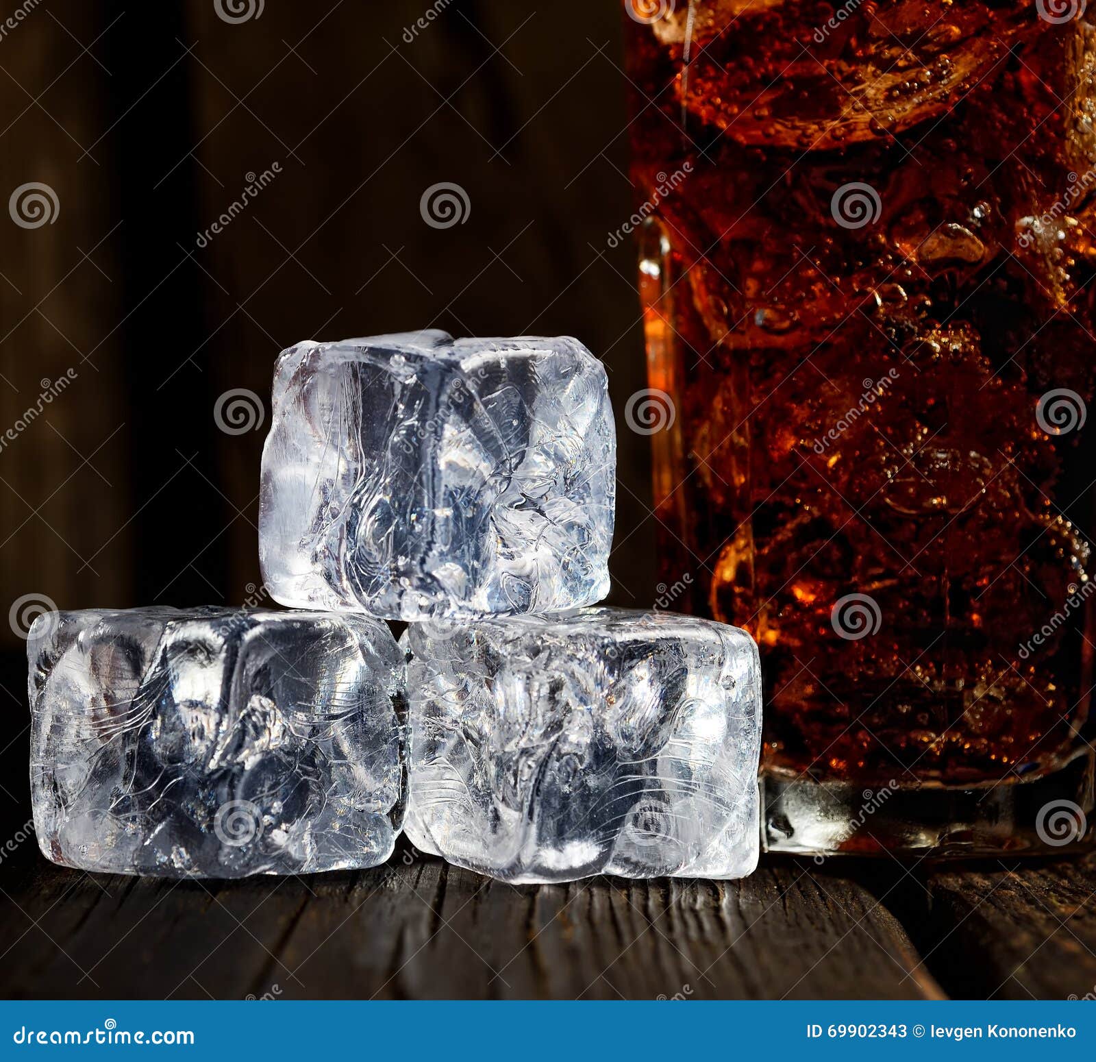 Ice Cubes, Cola on a Dark Wooden Background Stock Image - Image of ...