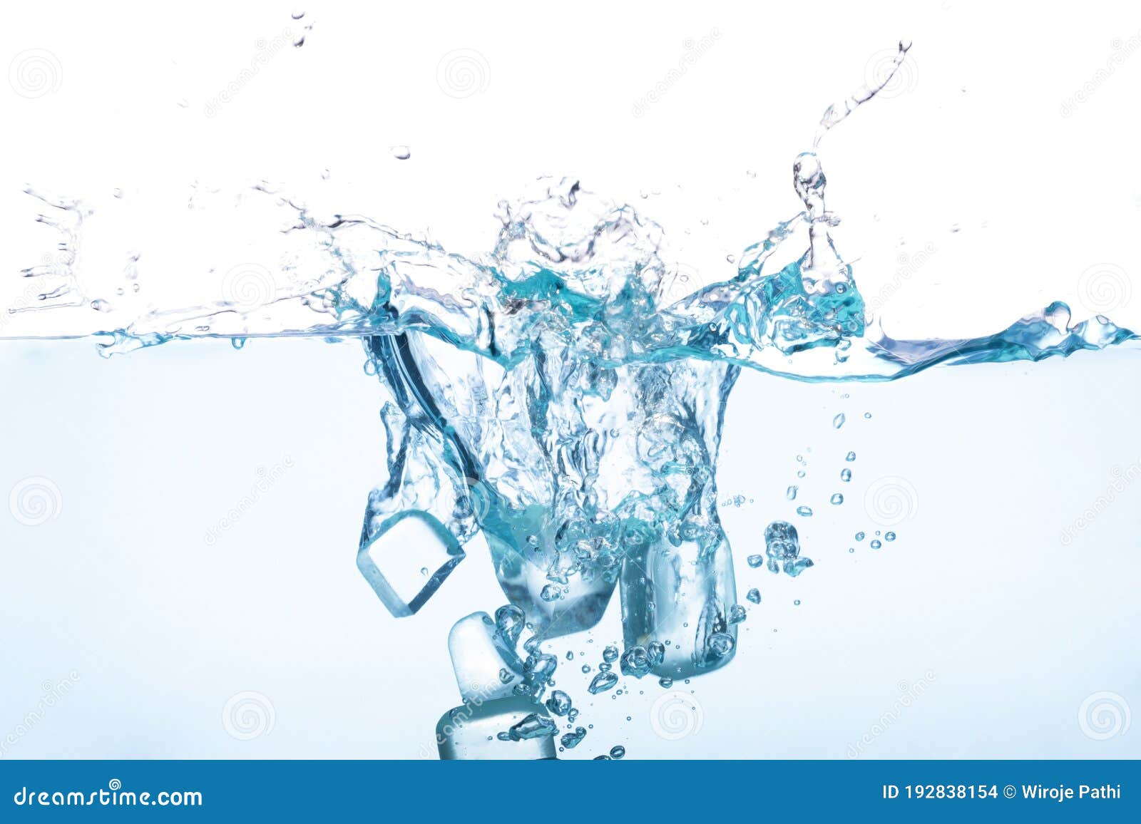 Ice Cubes Falling in the Water with Splattered Water is the Concept of ...