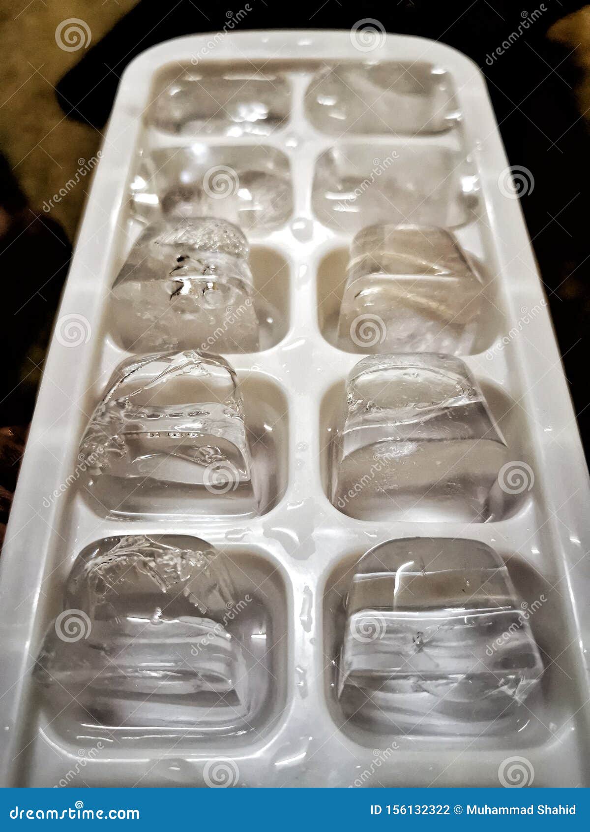 ICE CUBES in LONG TRAY stock photo. Image of froze, drink - 156132322
