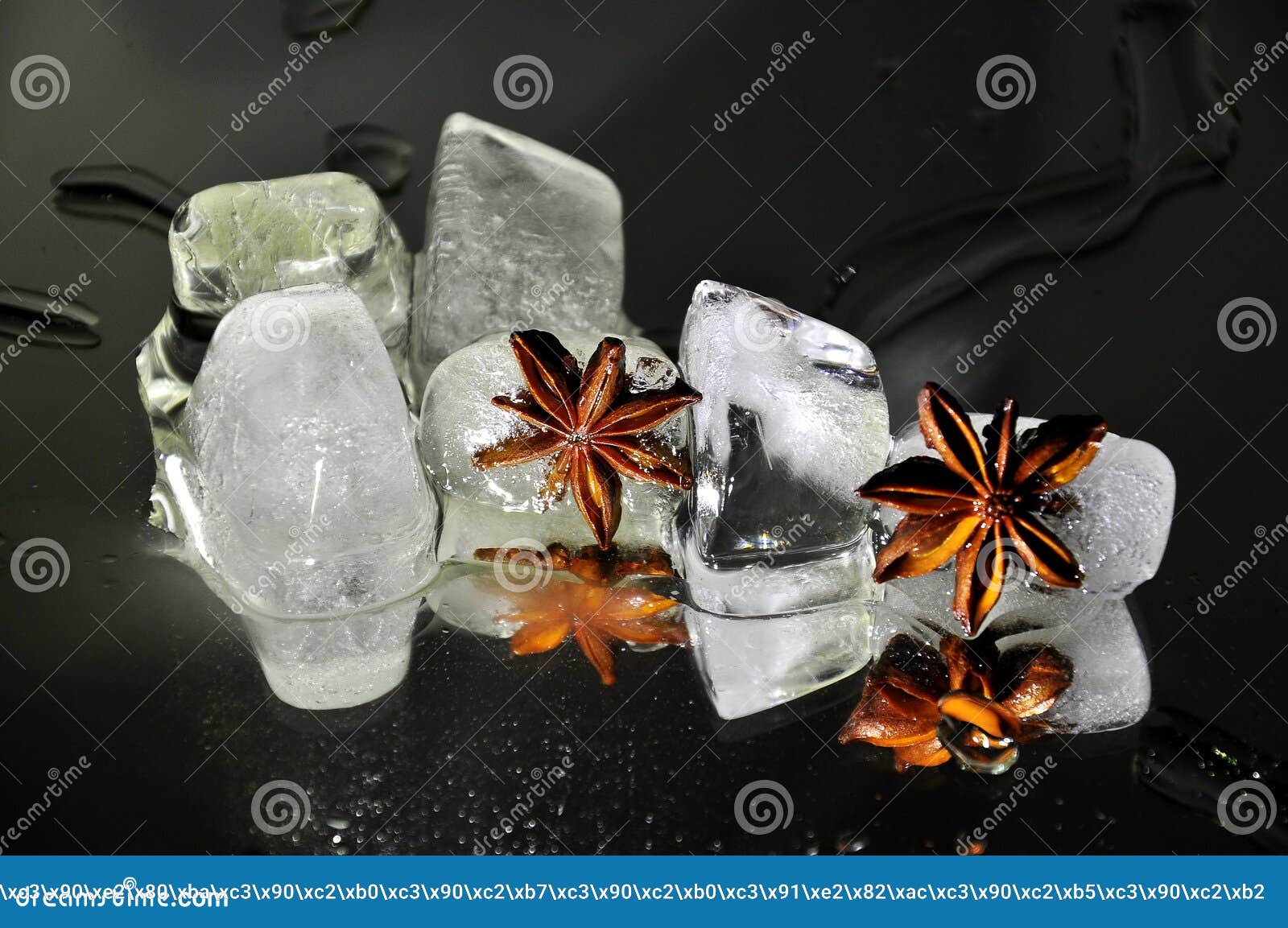 Ice Cubes on a Mirror Surface and Aniseed Stars. Stock Image - Image of ...