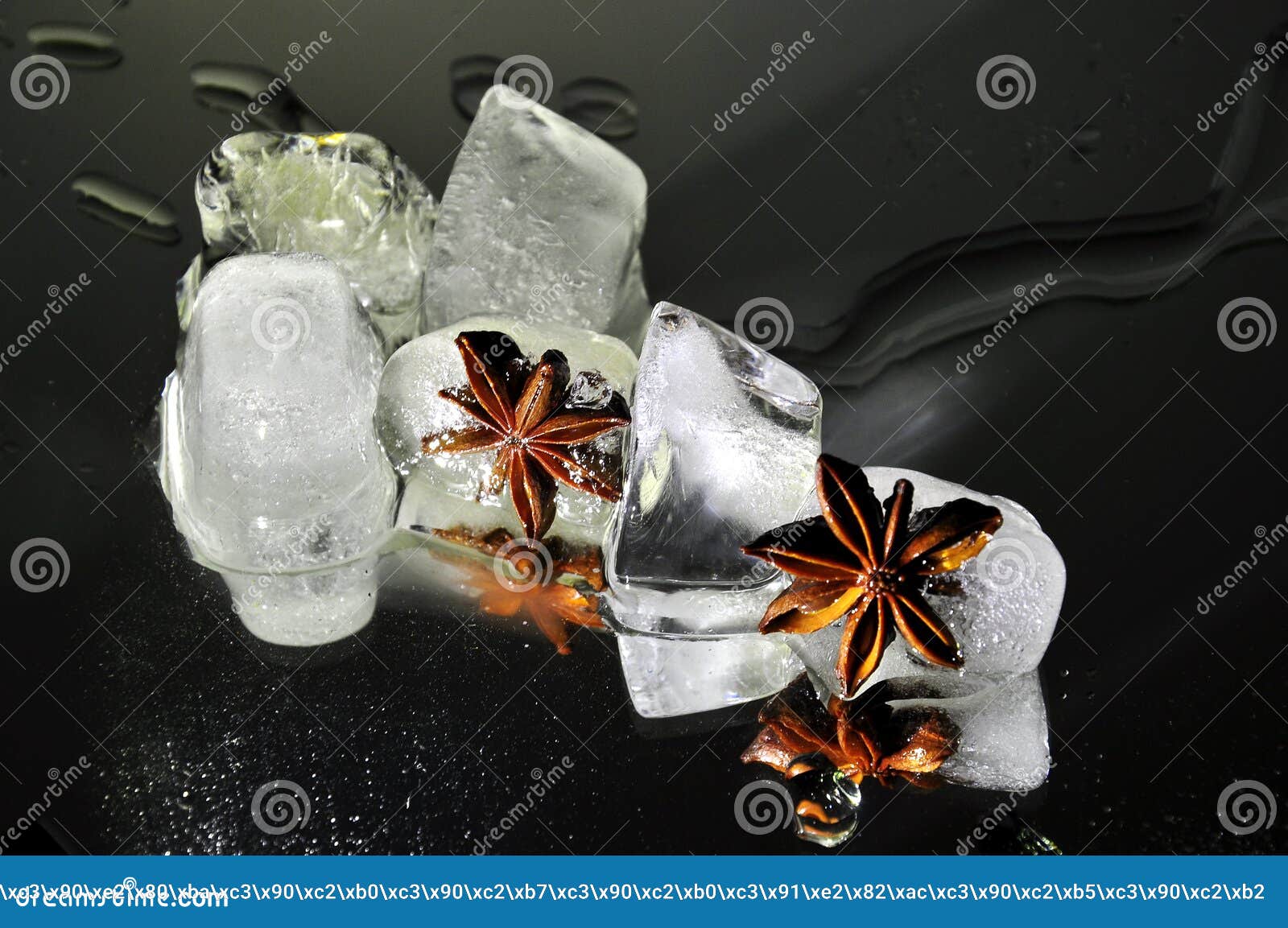 Ice Cubes on a Mirror Surface and Aniseed Stars. Stock Photo - Image of ...