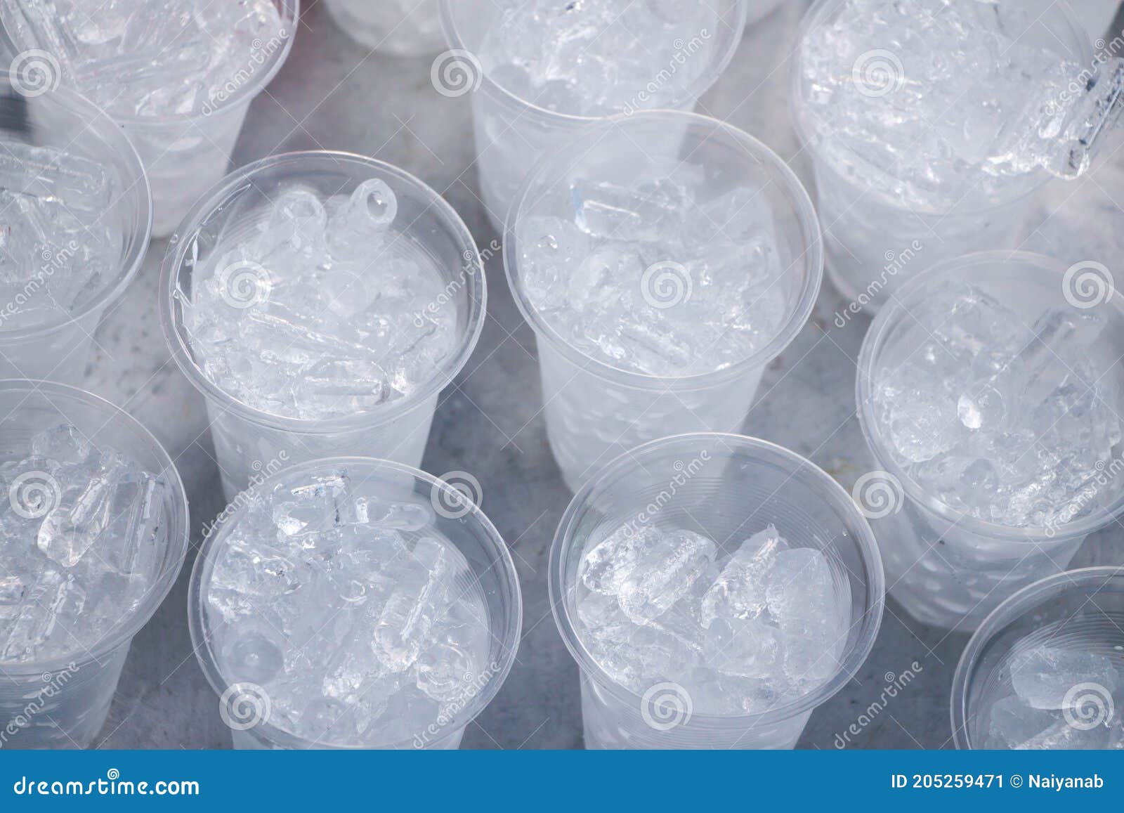 Ice cubes in plastic cup stock image. Image of food - 205259471