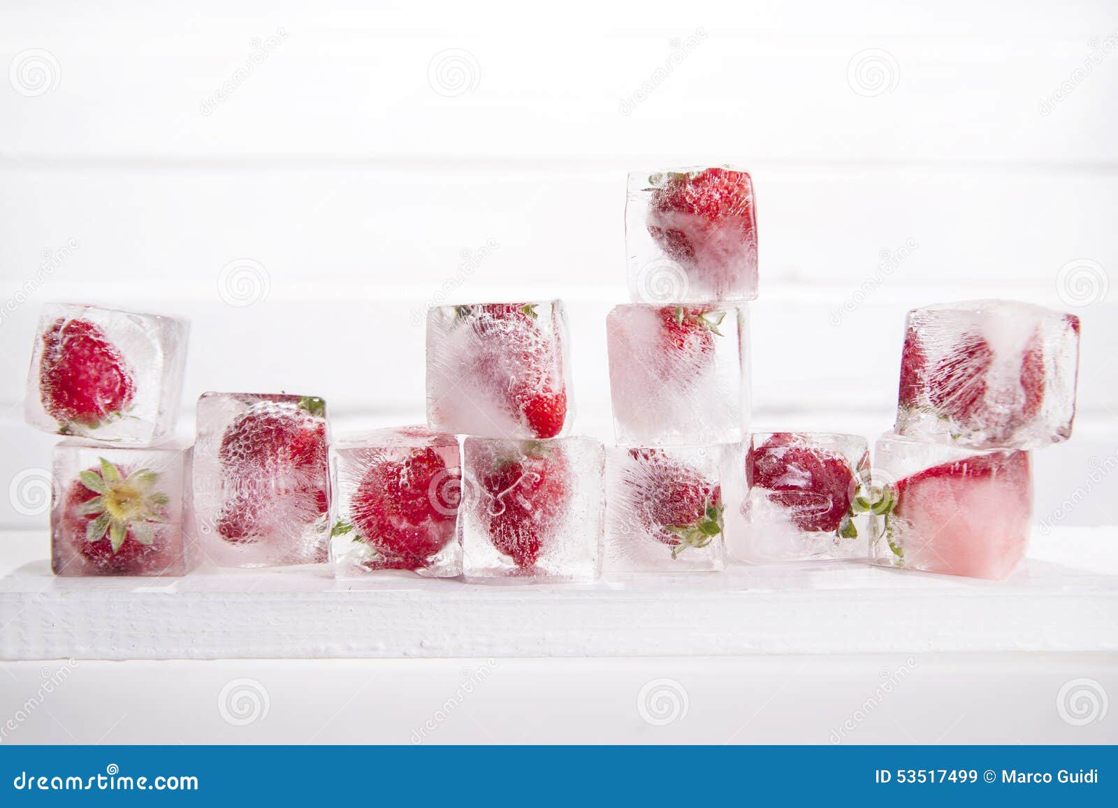 Ice Cubes with Strawberries Stock Image - Image of cold, fruit: 53517499
