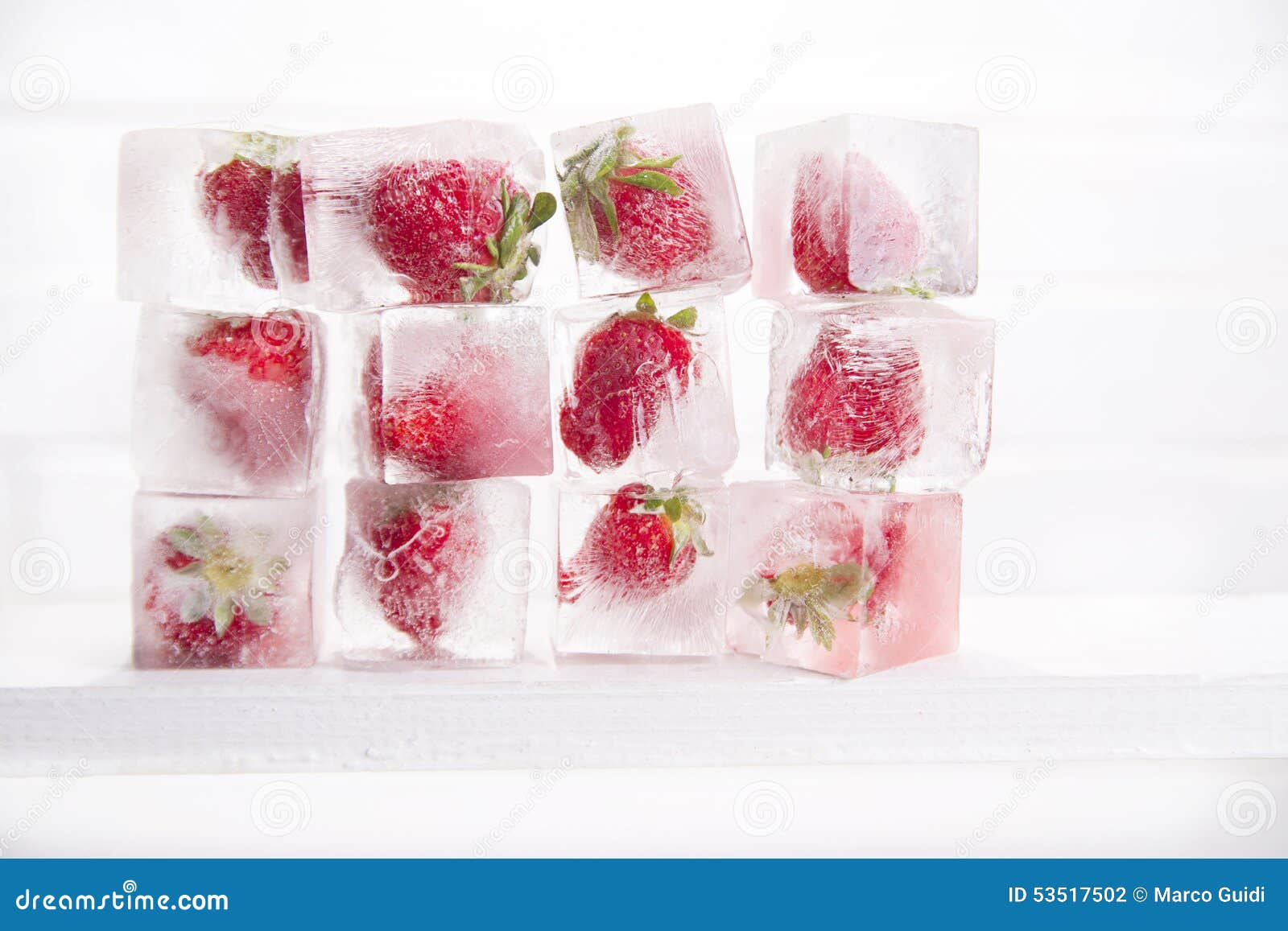 Ice Cubes with Strawberries Stock Photo - Image of frozen, fruit: 53517502