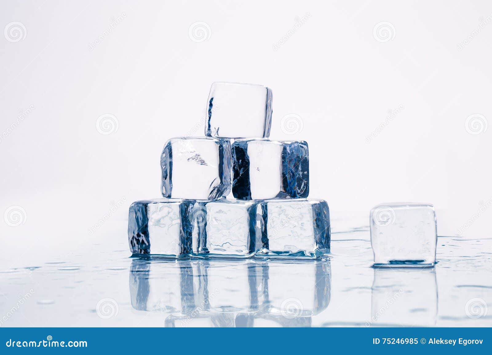 Ice cubes on table stock image. Image of translucent - 75246985