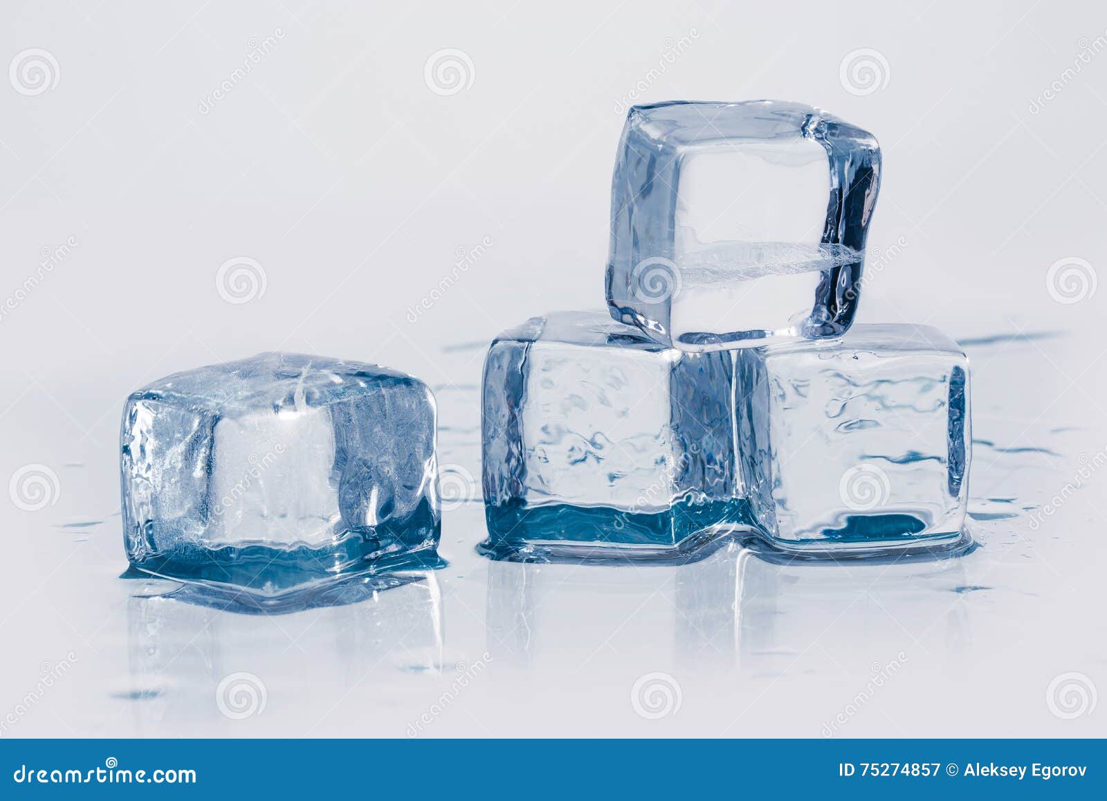 Ice cubes on table stock image. Image of object, pyramid - 75274857