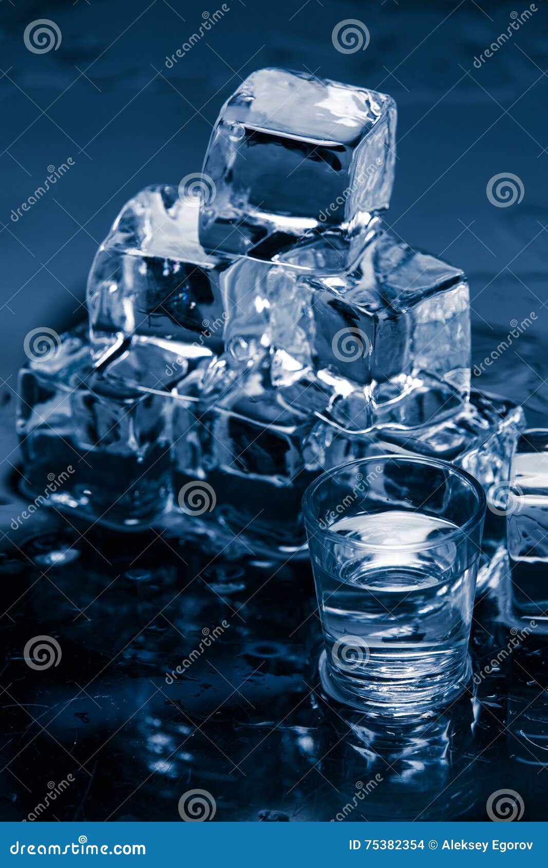 Ice cubes on table stock photo. Image of translucent - 75382354
