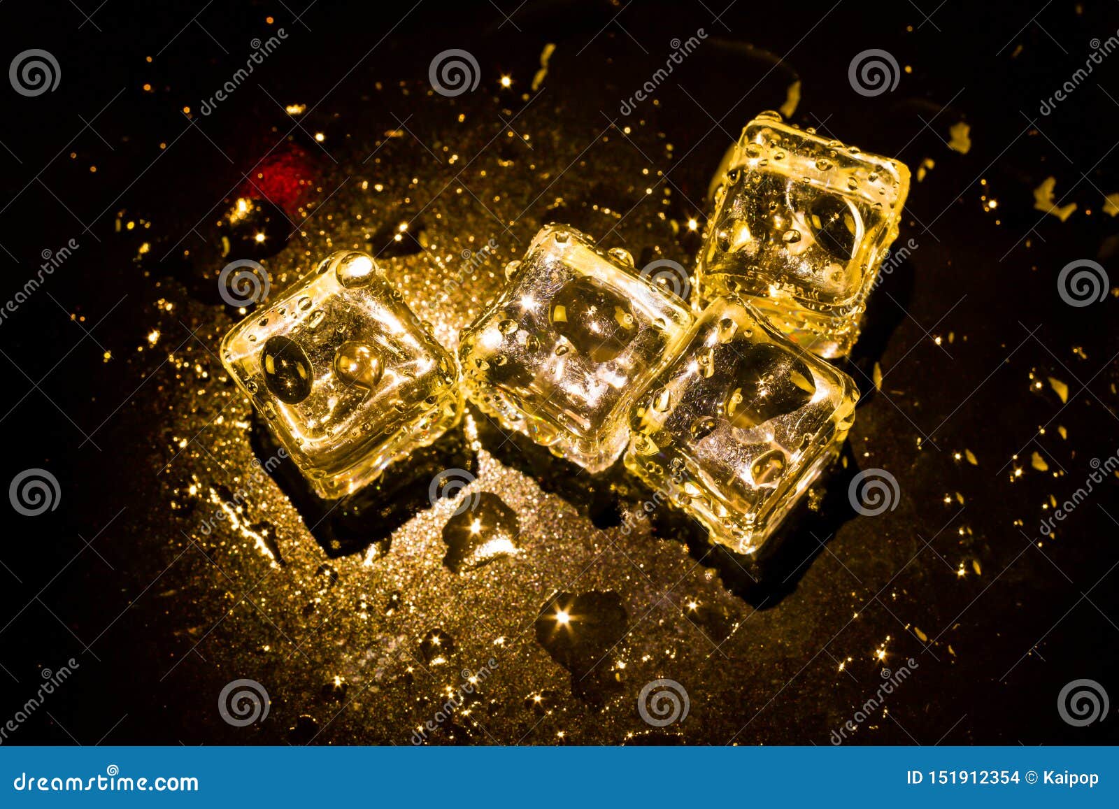 Ice Cubes and Water Drop on Light Golden Background Stock Photo - Image ...