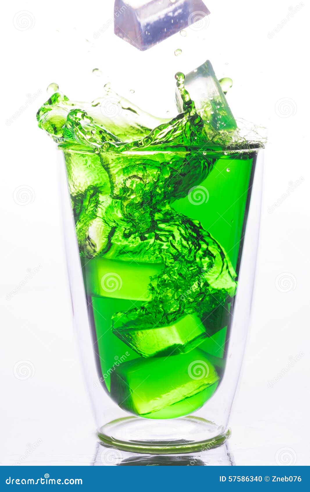 Ice Drop To Glass of Green Water Stock Photo - Image of pouring ...