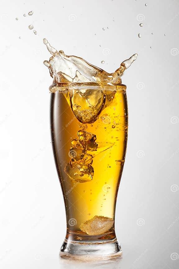 Ice Falling into Beer Glass with Splash Stock Image - Image of alcohol ...