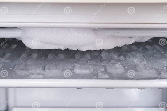 Ice in freezer stock image. Image of freezer, frozen - 68806147