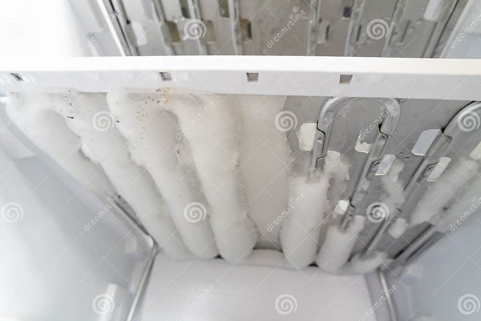 Ice in the Freezer, Defrosting of the Fridge and Freezer Stock Image ...