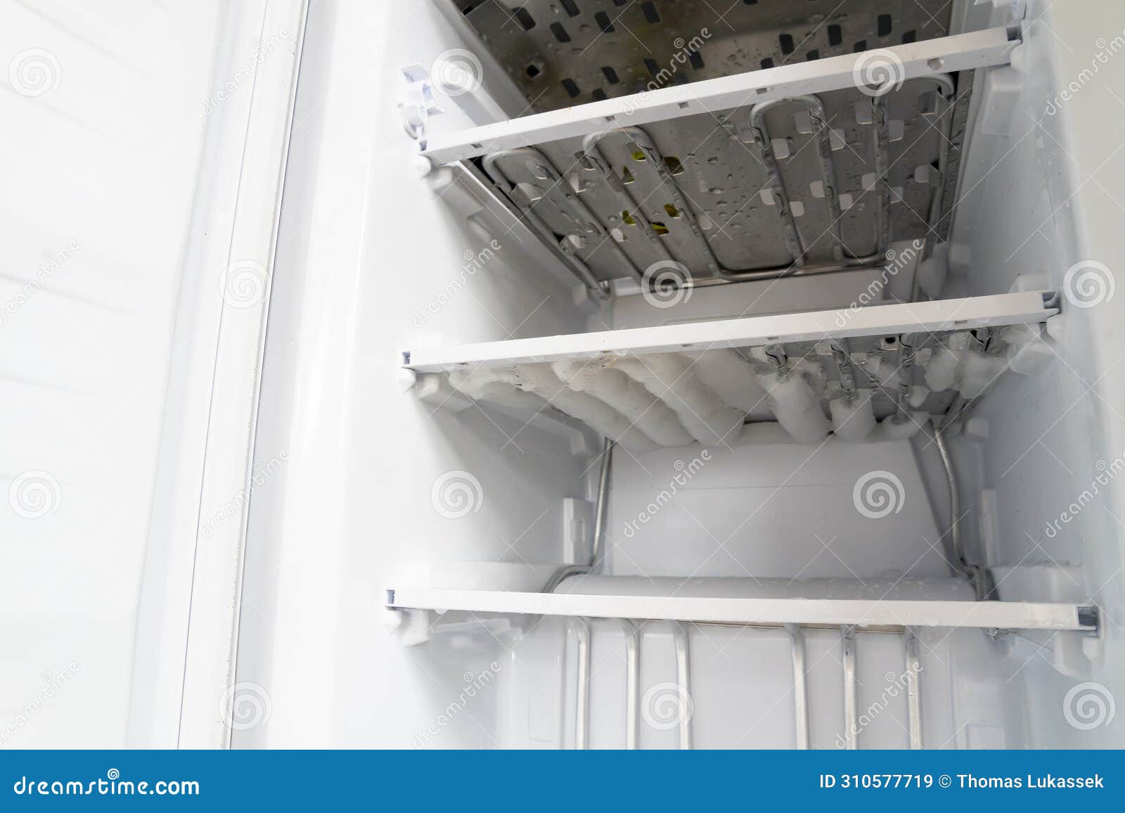 Ice in the Freezer, Defrosting of the Fridge and Freezer Stock Image ...