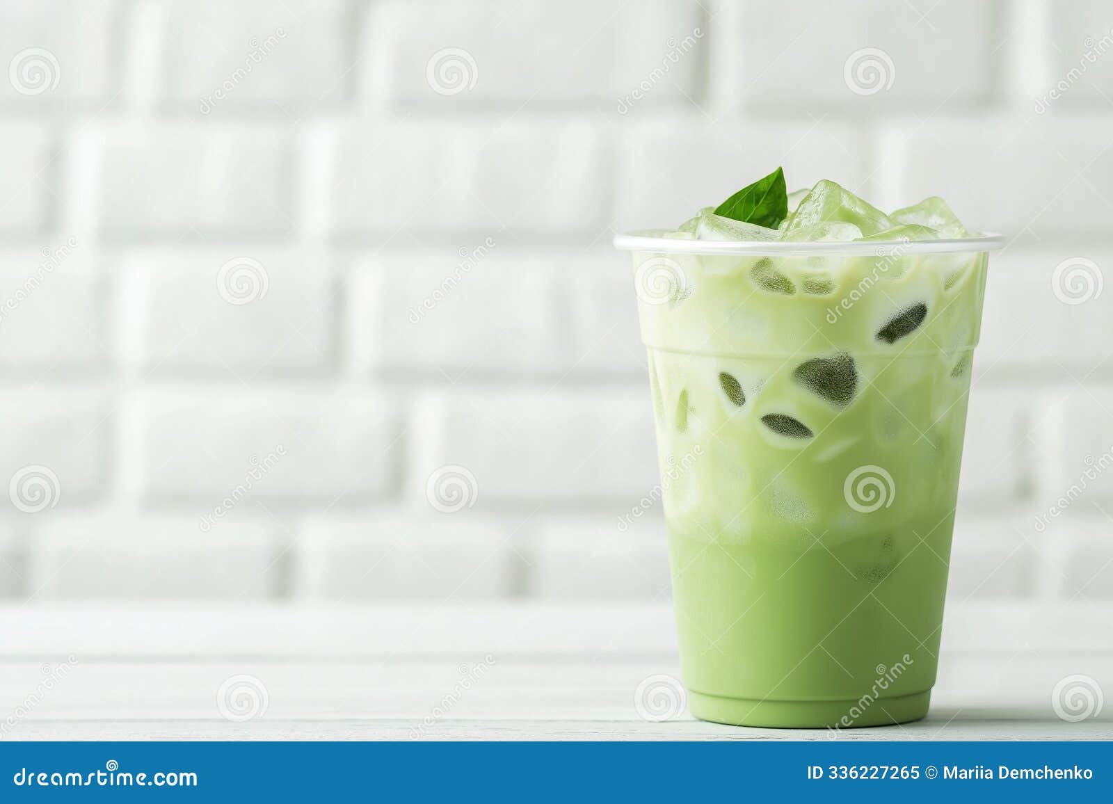 Ice Green Tea in Transparent Plastic Cup with Mint Leaves and Ice Cubes ...