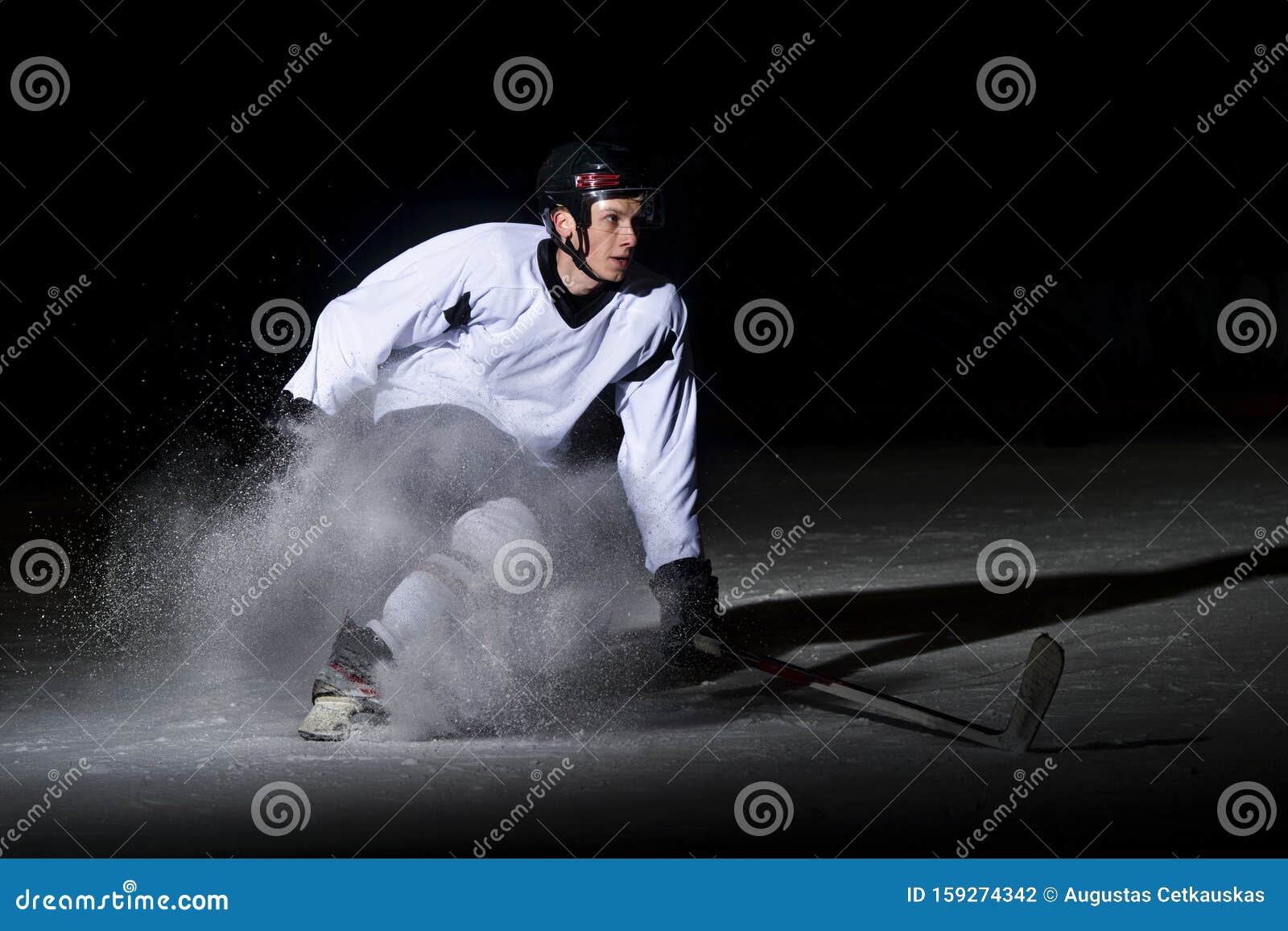 Ice Hockey Player in Action Kicking with Stick Stock Photo - Image of ...
