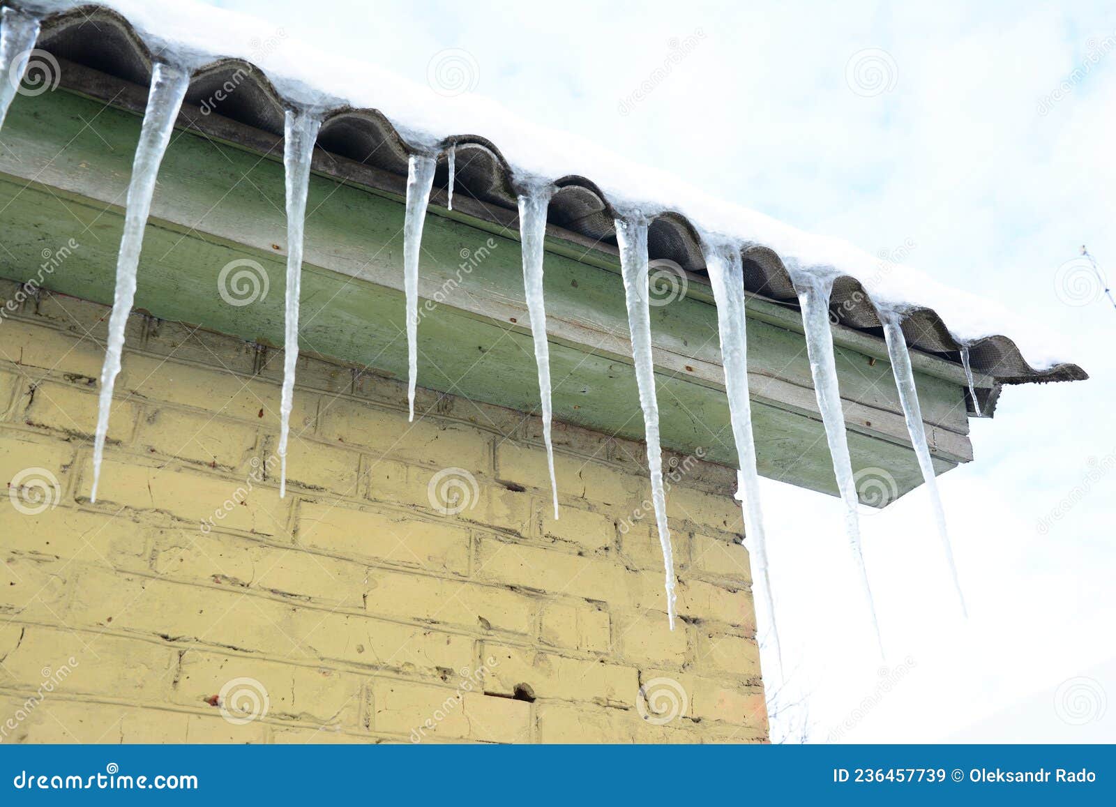 Ice Icicles Hanging from the Roof without a Roof Gutter. Ice Dams Hang ...