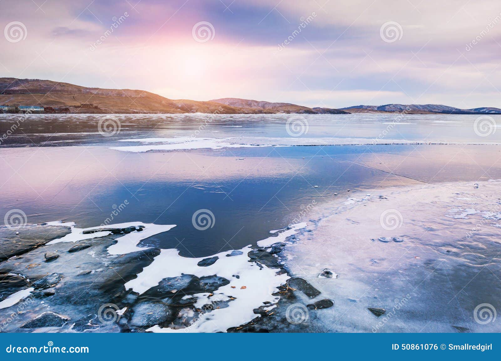 Ice on the lake at sunset stock photo. Image of purple - 50861076