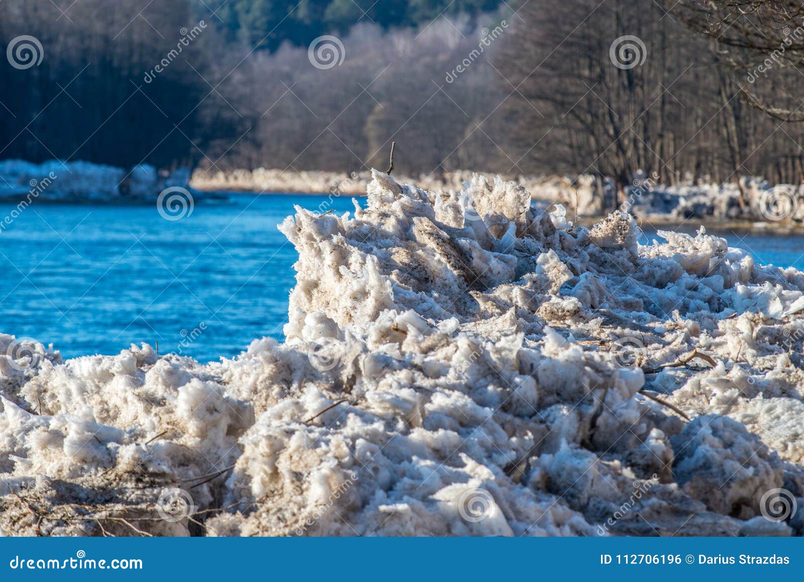 Ice Left on a Rivers Bank in Spring Stock Photo - Image of trees ...