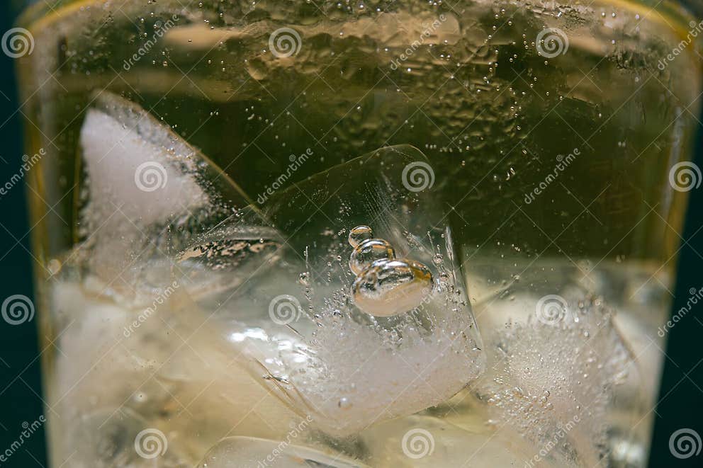 Ice Liquid in the Glass. Ice Cube Stock Image - Image of pattern ...