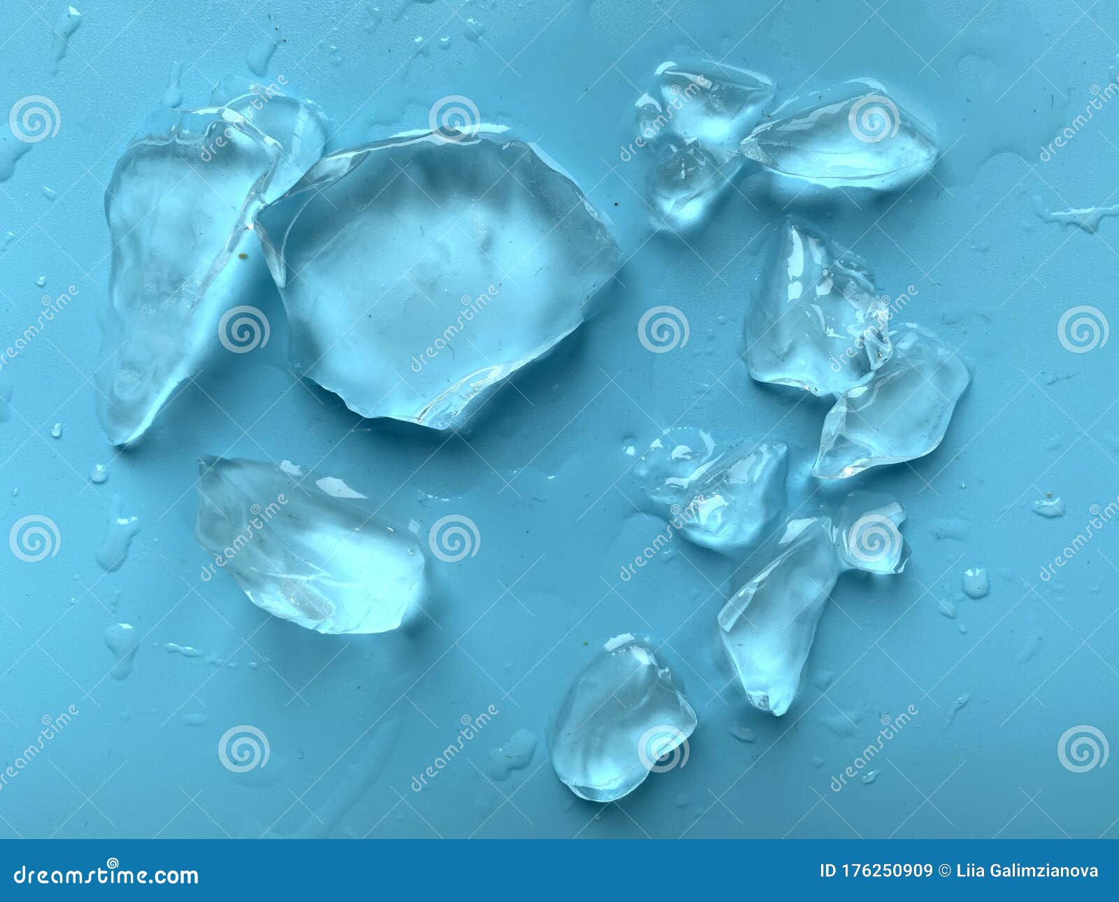 Ice Melting on Blue Background Stock Image - Image of summer ...