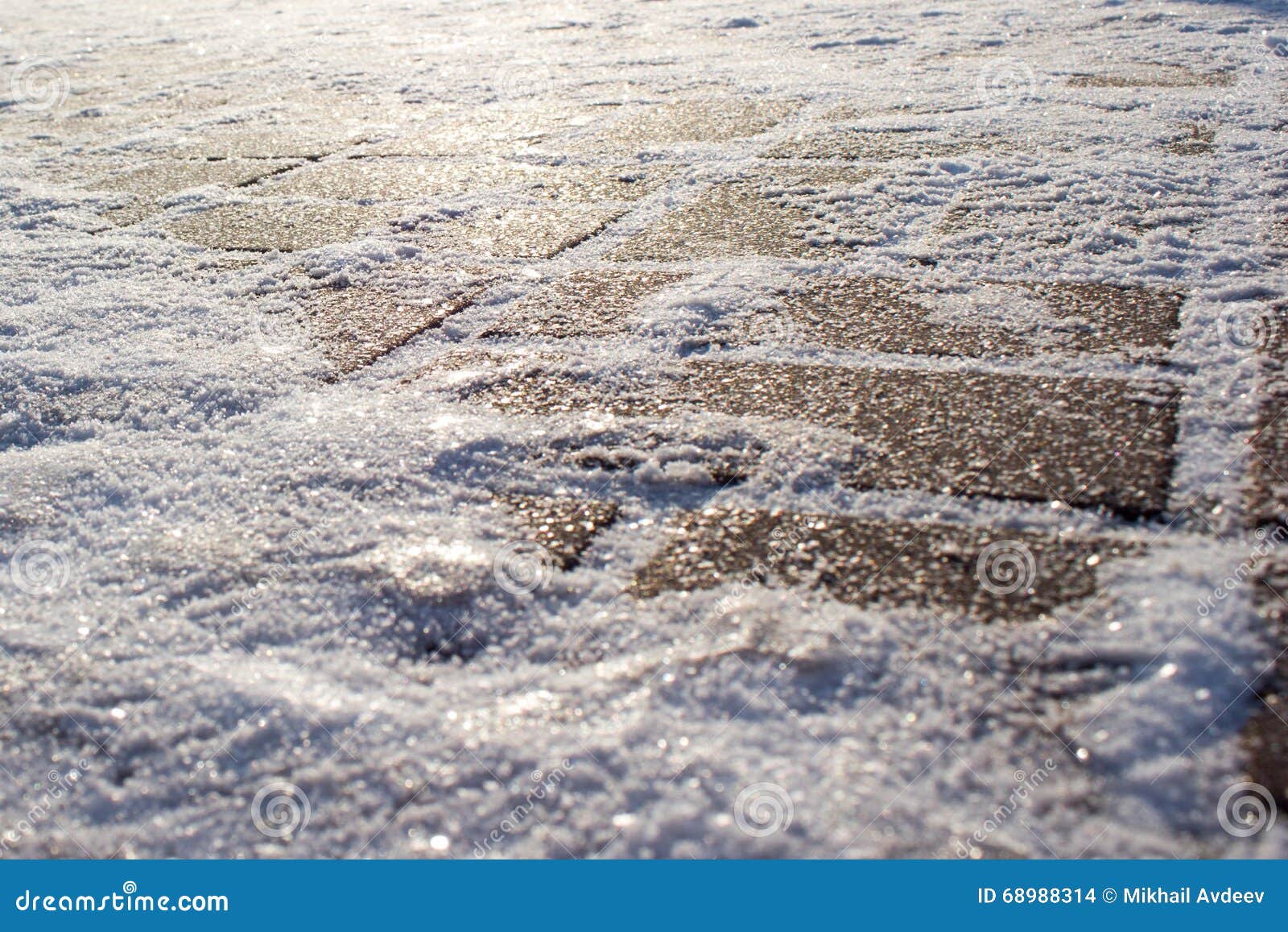 Ice on the pavement stock photo. Image of detail, winter - 68988314