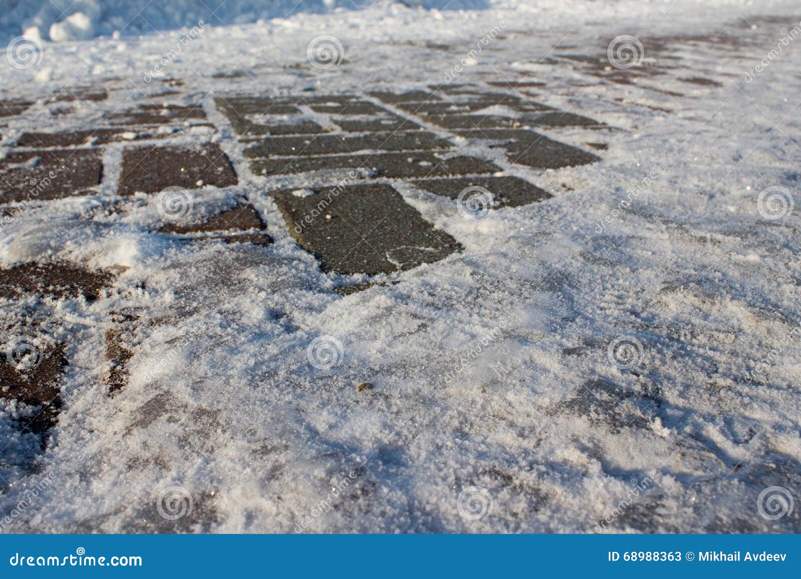 Ice on the pavement stock image. Image of closeup, brick - 68988363