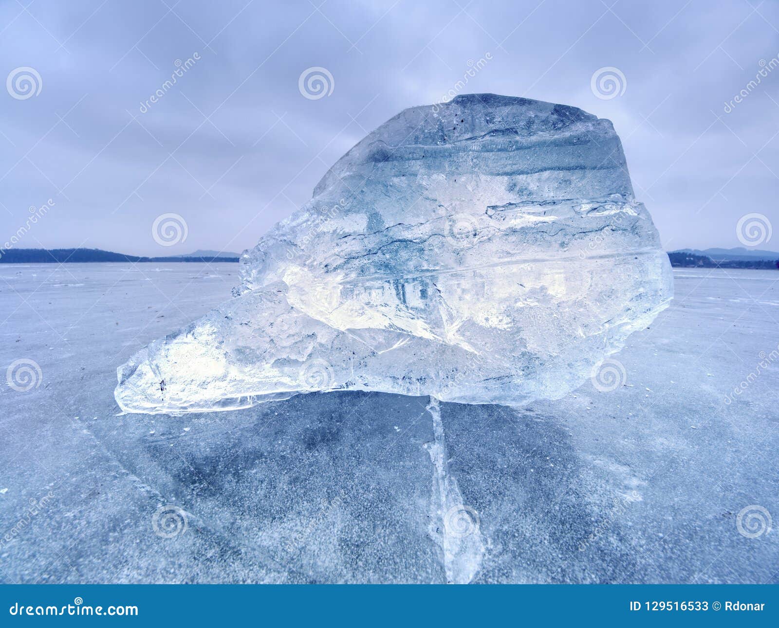 Ice Piece in Blue Shadows, on Dark Natural Background. Stock Image ...