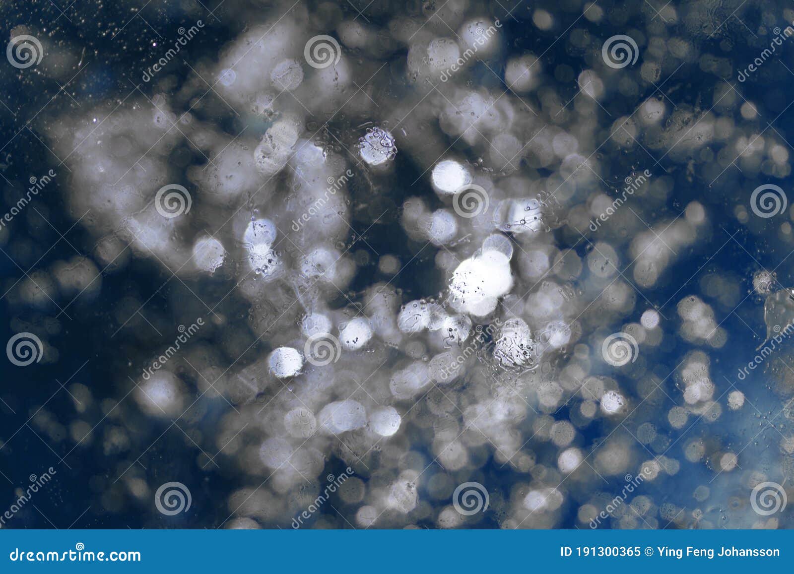 Ice in shades of blue stock image. Image of bubble, blue - 191300365