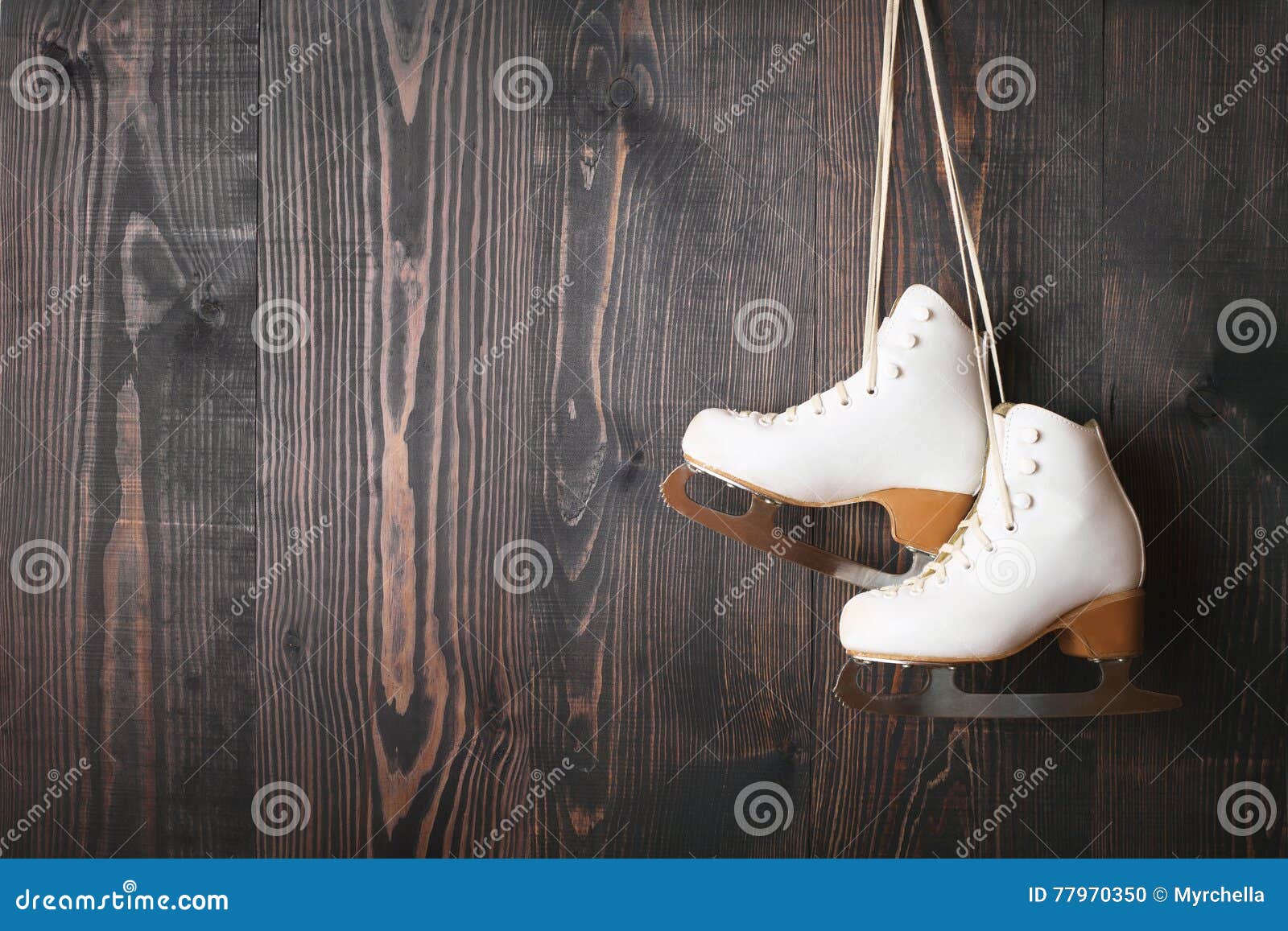 Ice Skates on a Wooden Background Stock Photo - Image of board, holiday ...