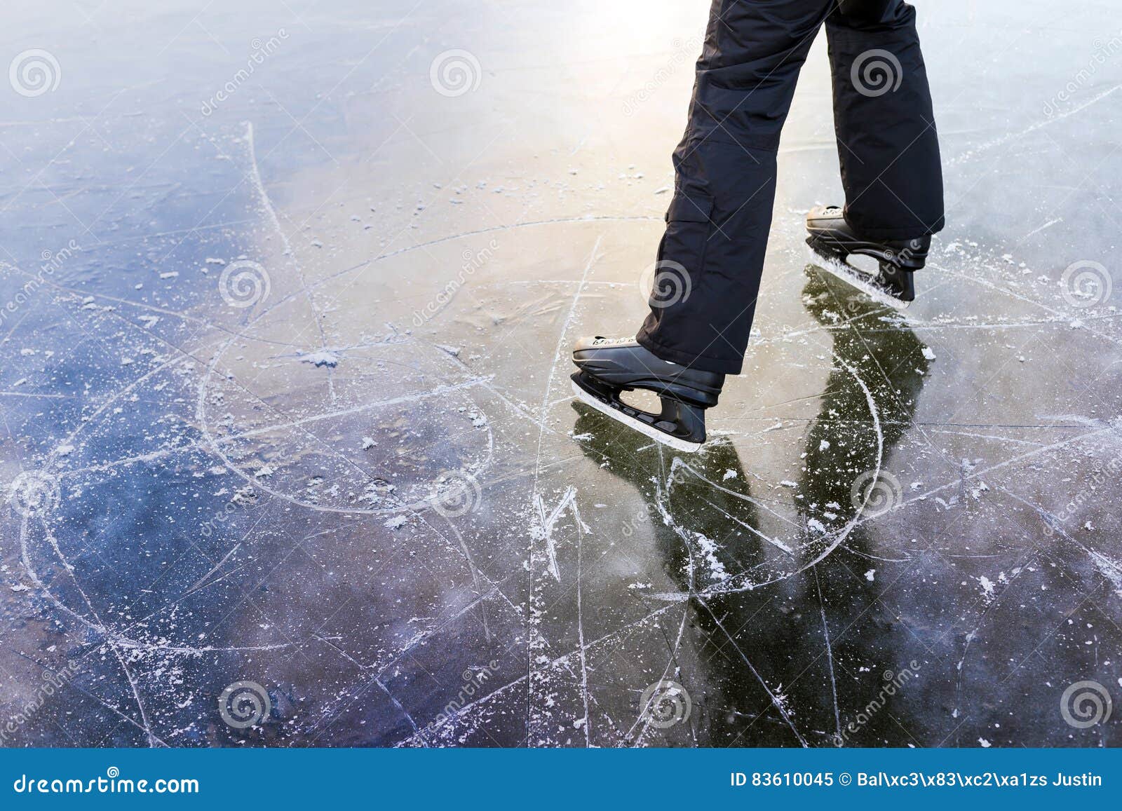 The Ice Skating Tracks, a Man Stands beside Her. Stock Image - Image of ...