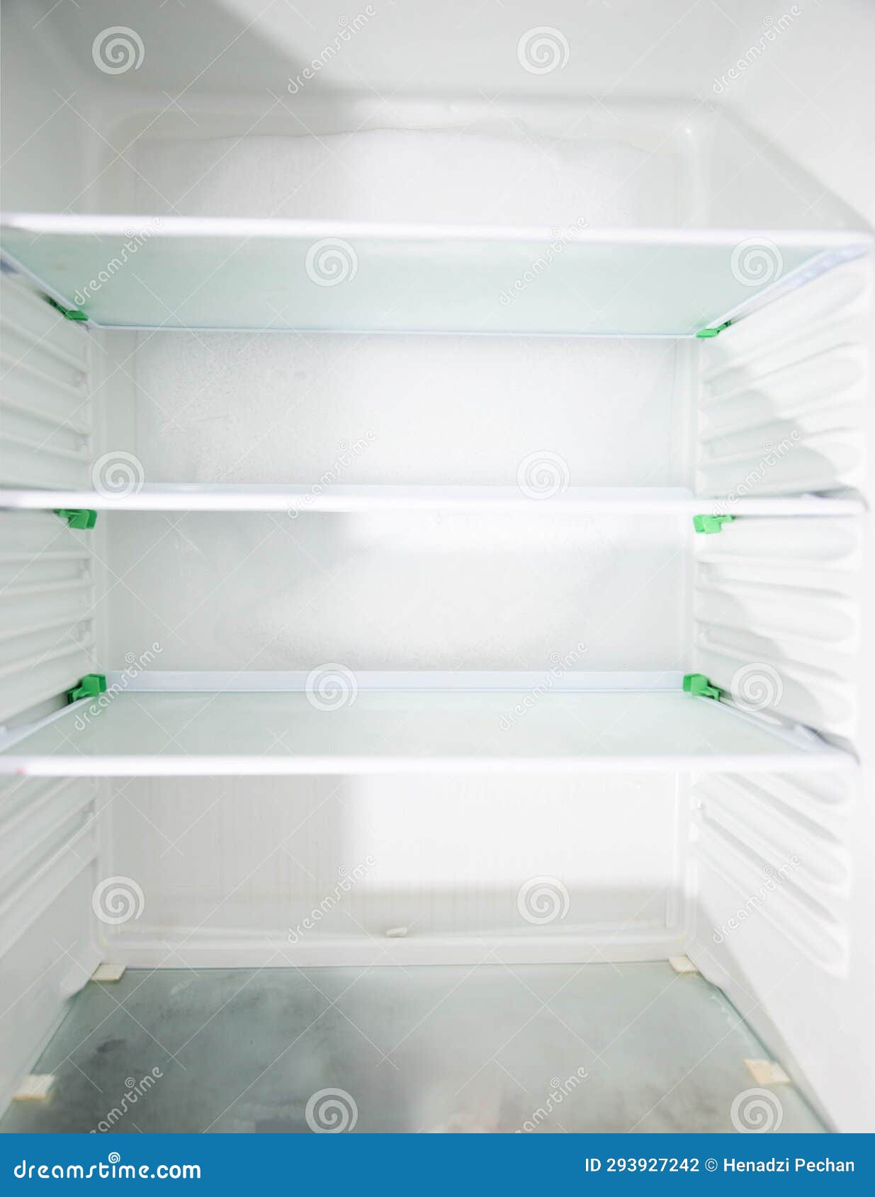 Ice and Snow Build Up on the Back Wall of the Refrigerator ...