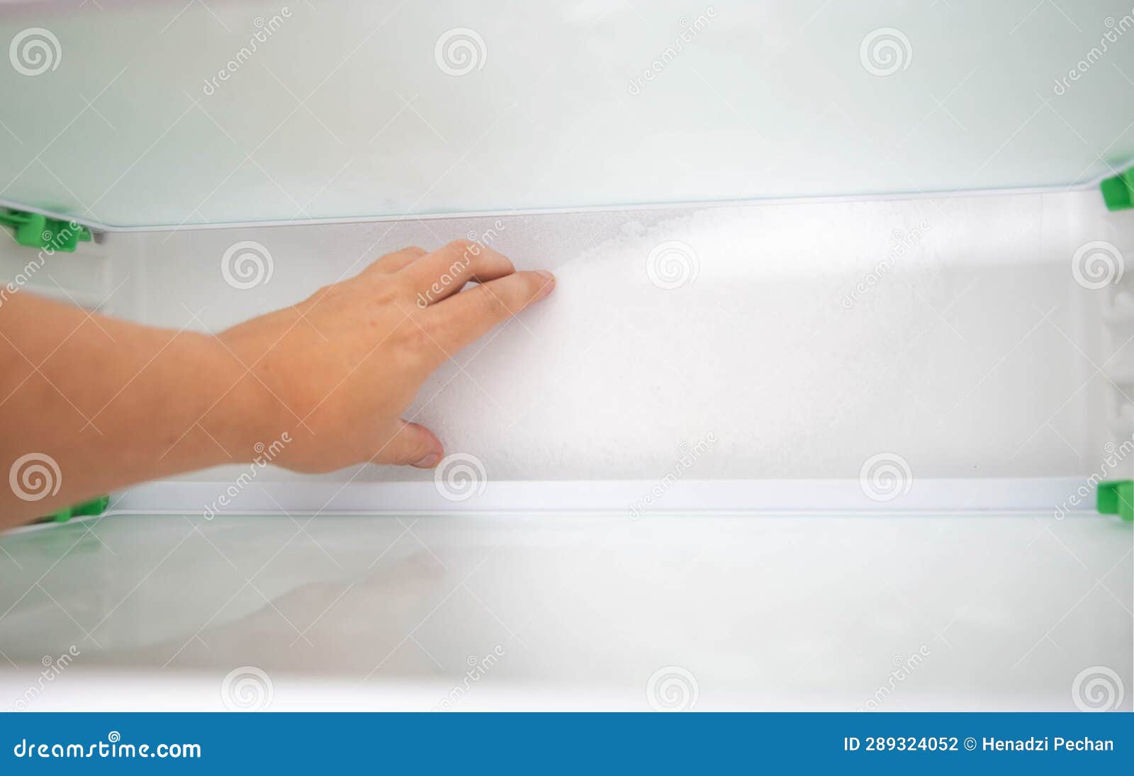 Ice and Snow Build Up on the Back Wall of the Refrigerator ...