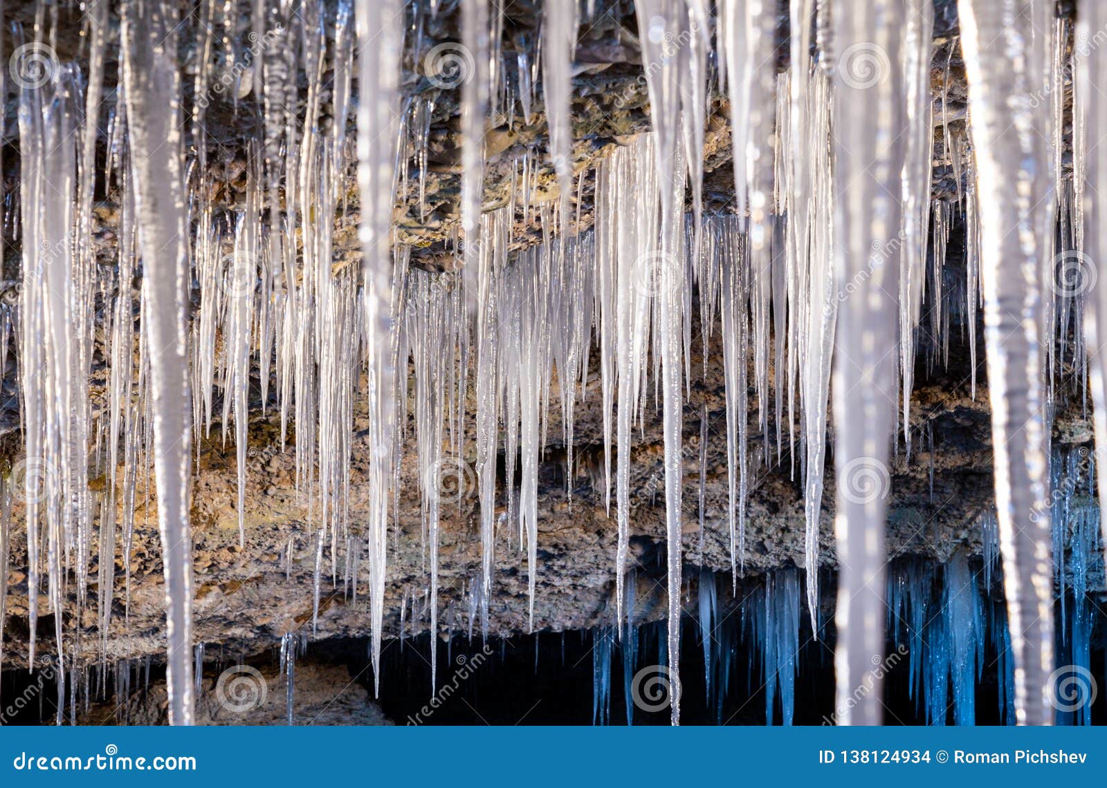 Ice Stalactites in the Cave Stock Photo - Image of amazing, blue: 138124934