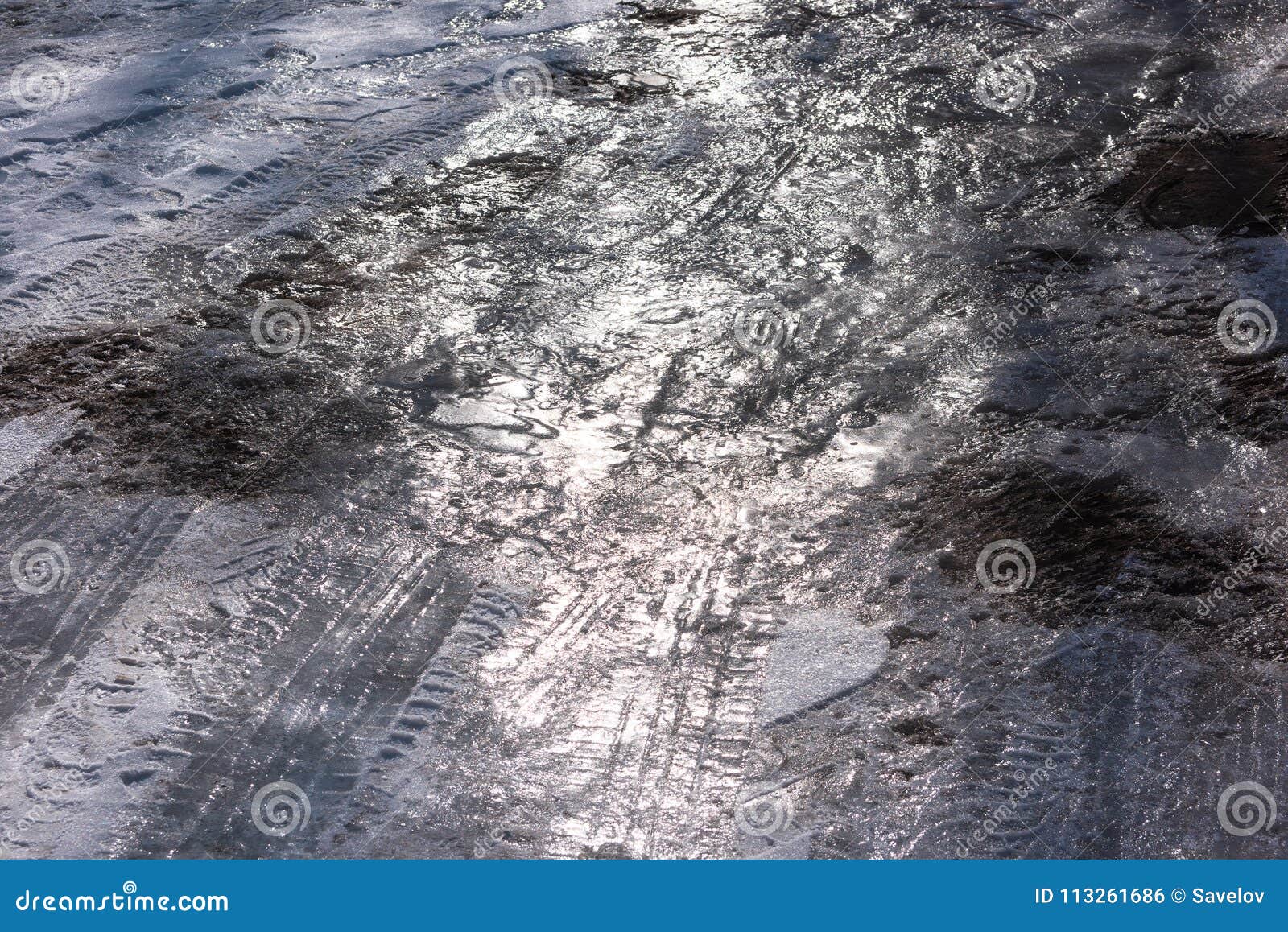 Ice, Mud, Tire Marks on the Road Stock Photo - Image of background ...