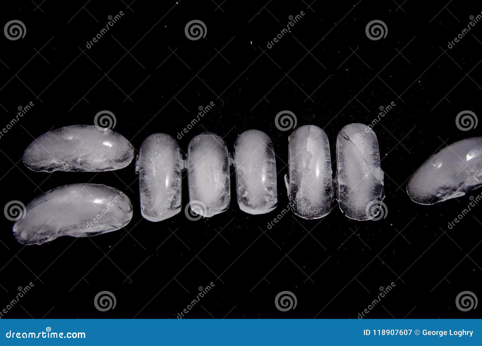 Ice is Water Frozen into a Solid State a Ice Cube`s Stock Image - Image ...