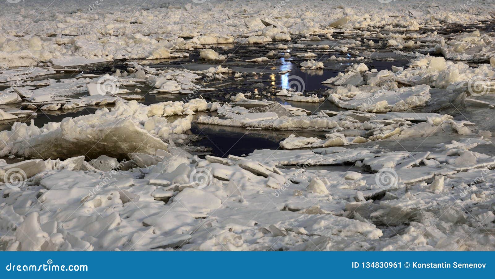 Ice on the water at night stock image. Image of night - 134830961
