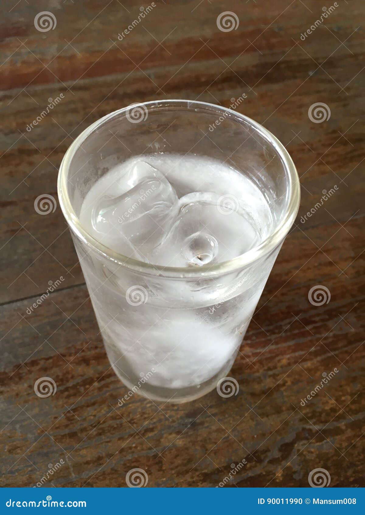 Ice water on wood table stock photo. Image of clean, cool - 90011990