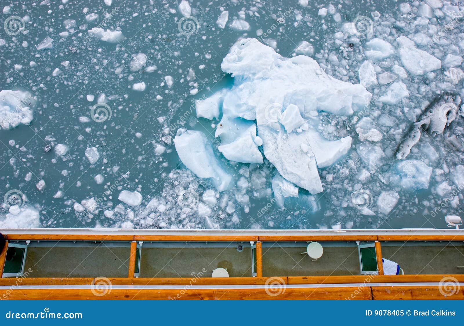 Iceberg beside cruise ship stock image. Image of water - 9078405
