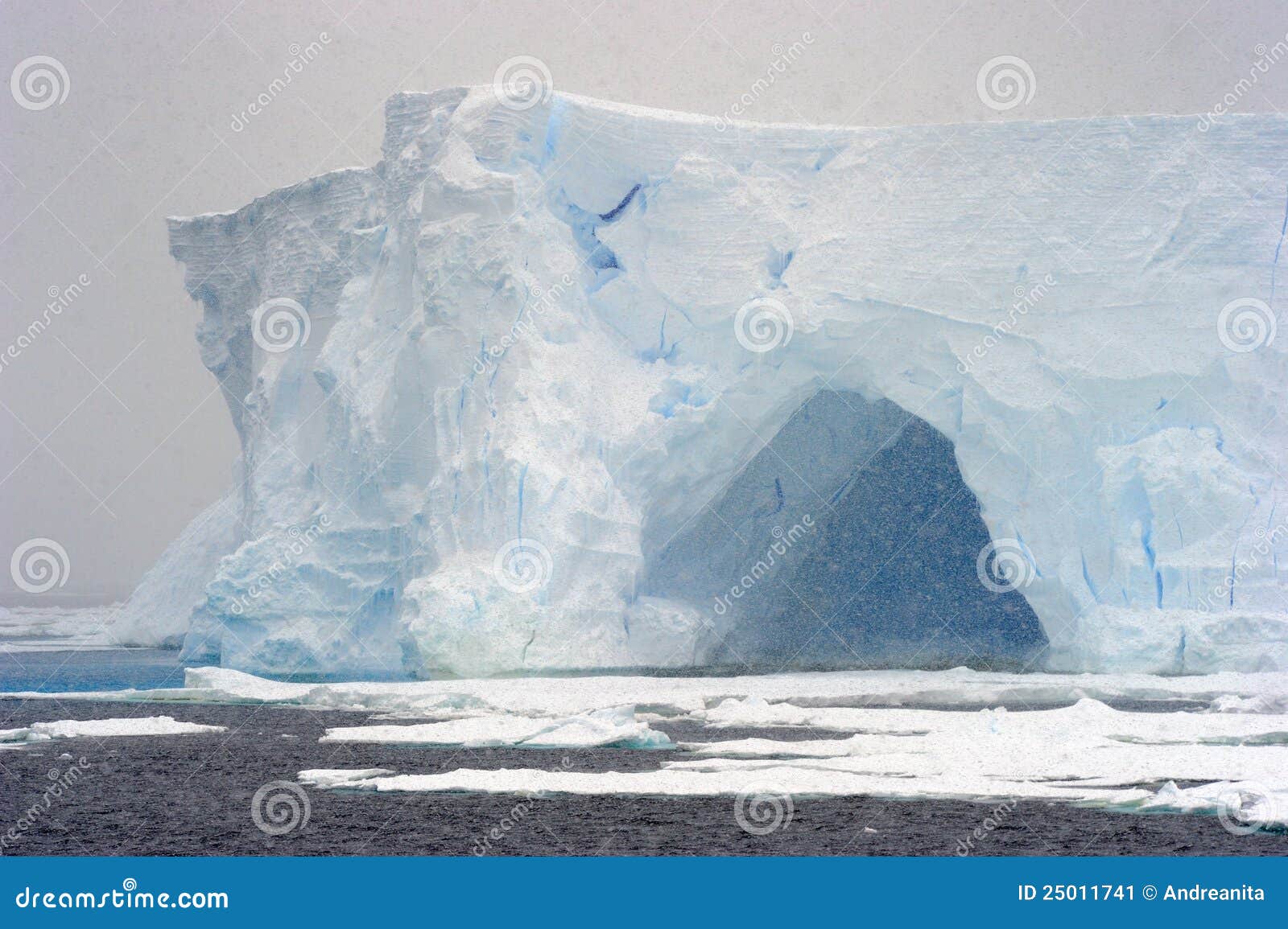 Iceberg in a Snow blizzard stock image. Image of blue - 25011741