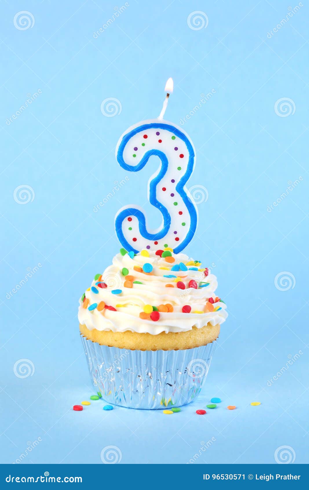 Iced Birthday Cupcake with with Lit Number 3 Candle Stock Image - Image ...