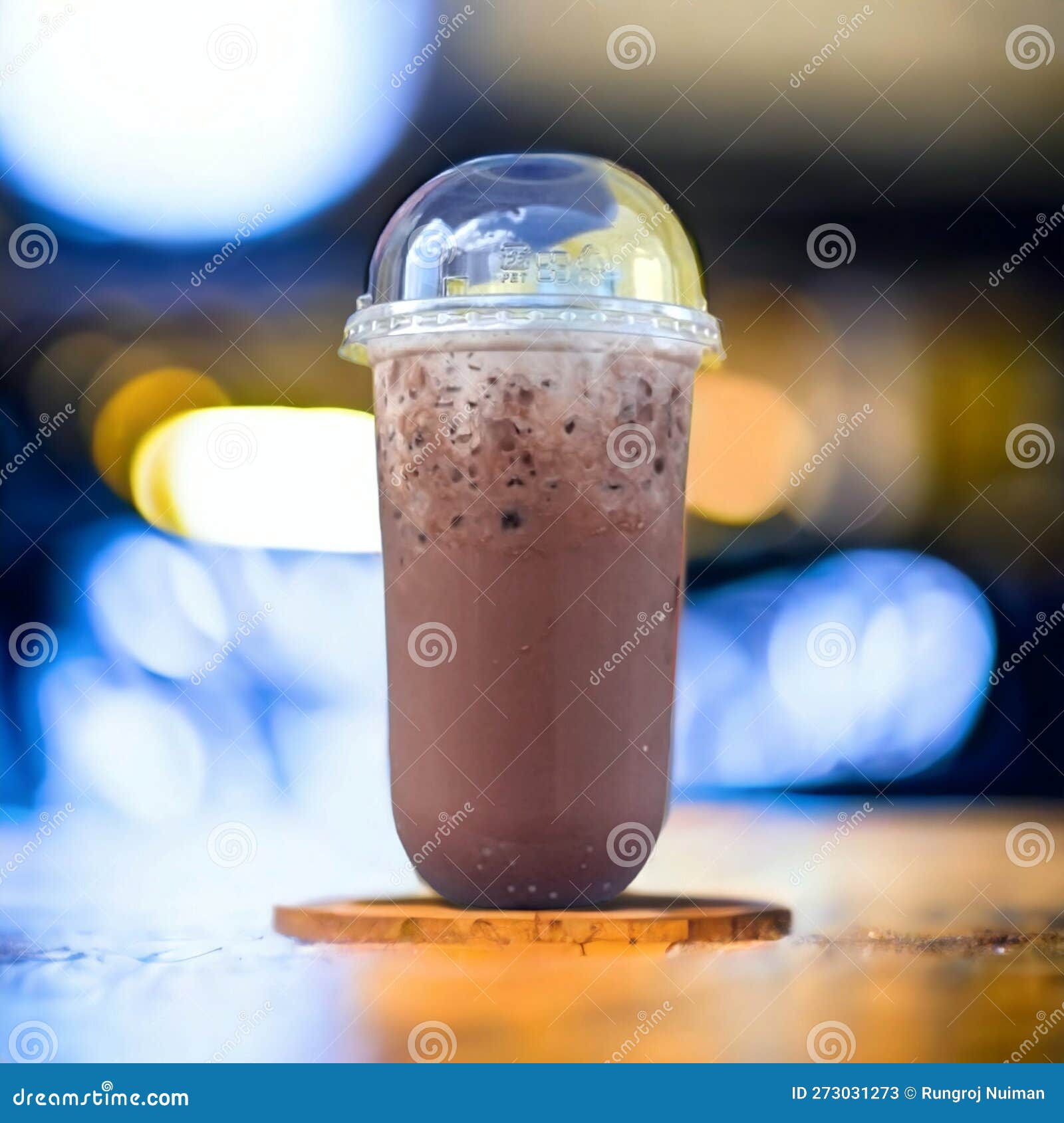 Iced Cocoa in a Clear Plastic Cup Covered with a Hemispherical Lid. the ...