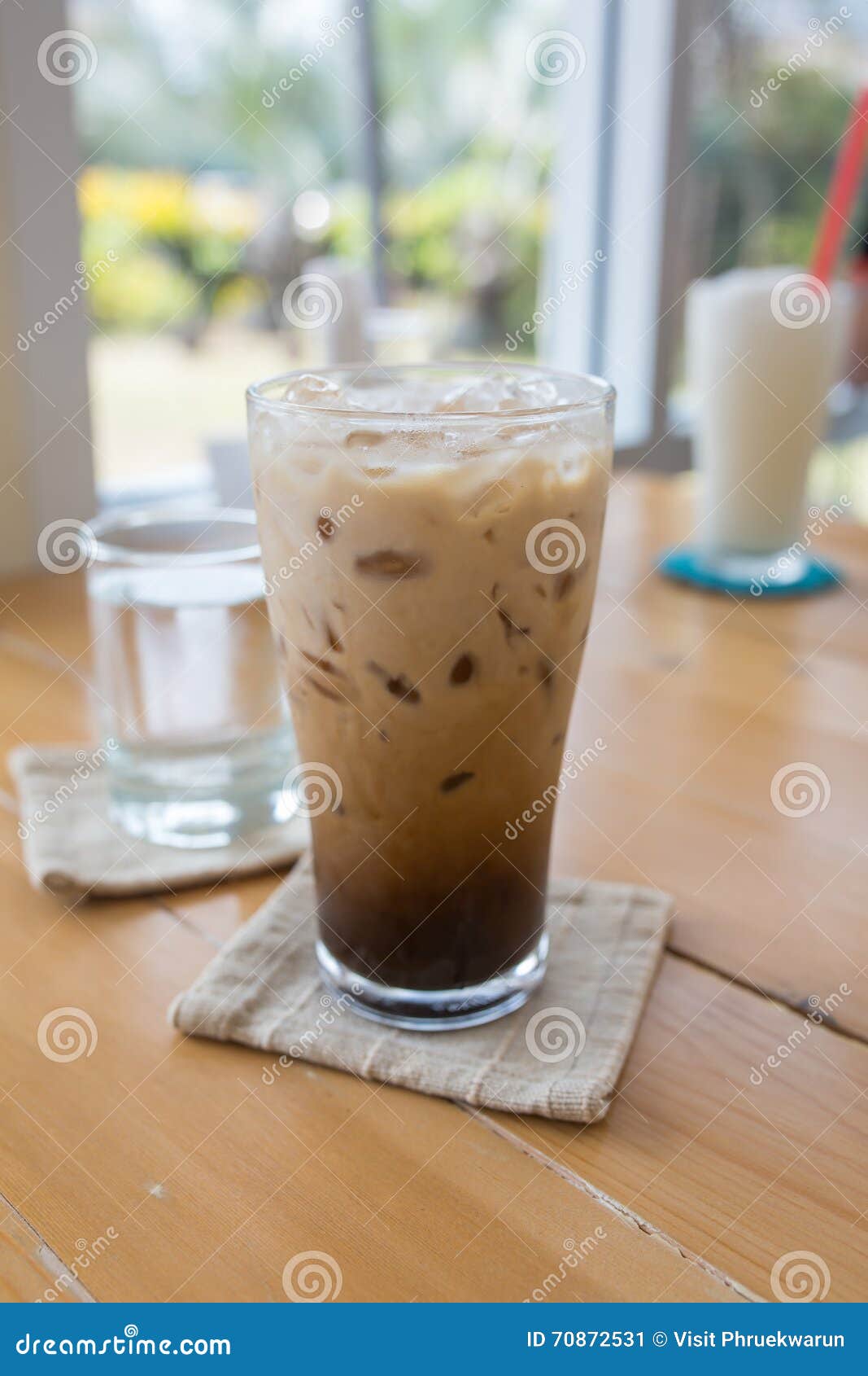 Iced Coffee in Glass on the Table Stock Image - Image of cream, iced ...