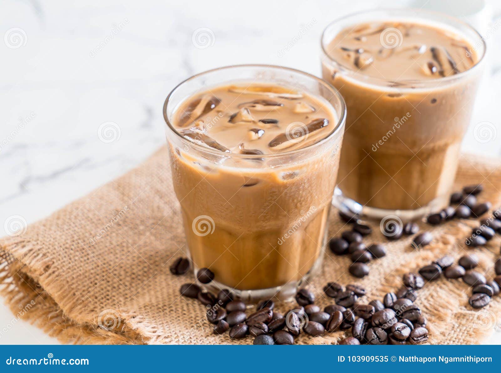 Iced coffee with milk stock image. Image of caffeine - 103909535