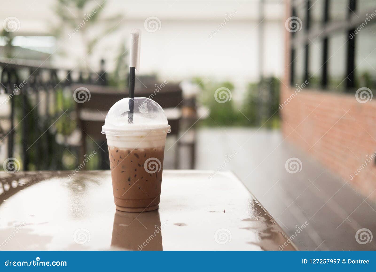 Iced Coffee on a Wooden Table Stock Image - Image of tasty, shake ...