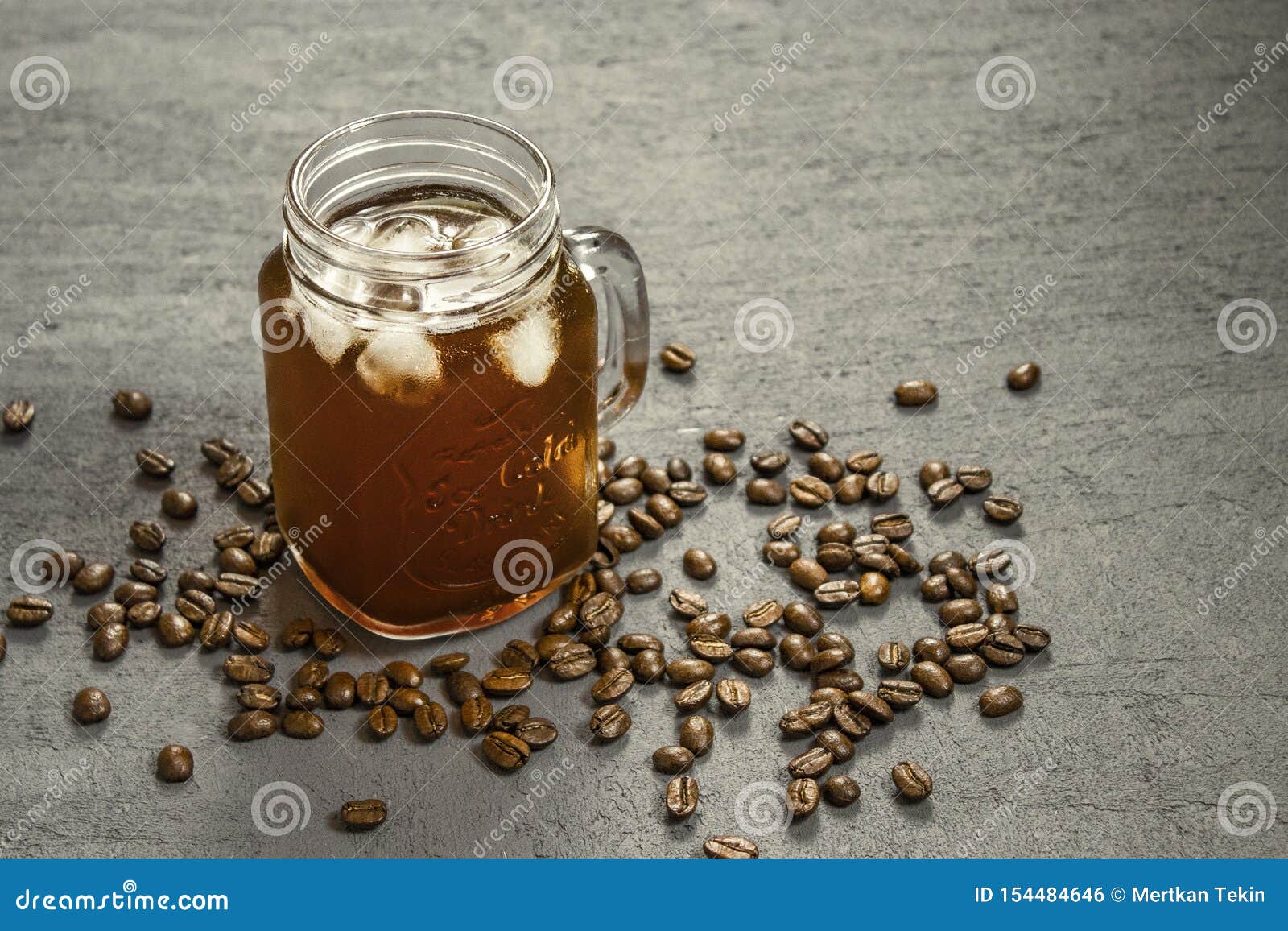 Iced Filter Coffee and Coffee Beans on Isolated Background Stock Photo ...
