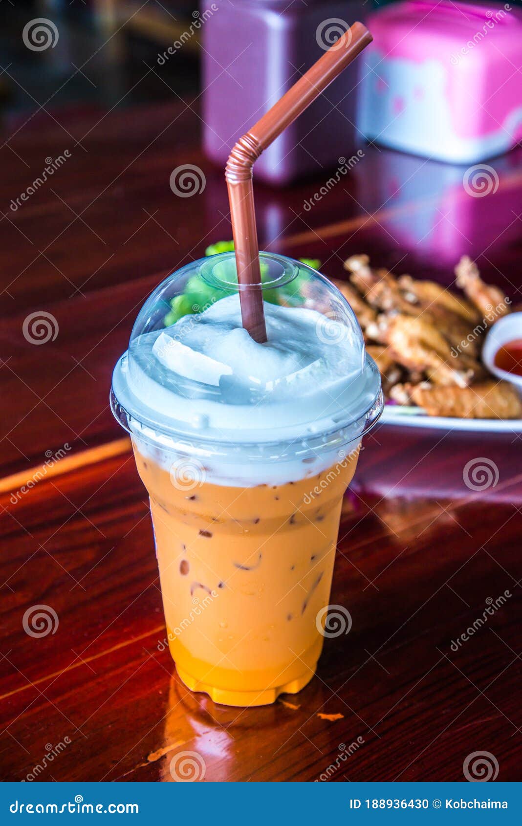 Iced Milk Tea in Plastic Cup Stock Photo - Image of mixed, appetizing ...